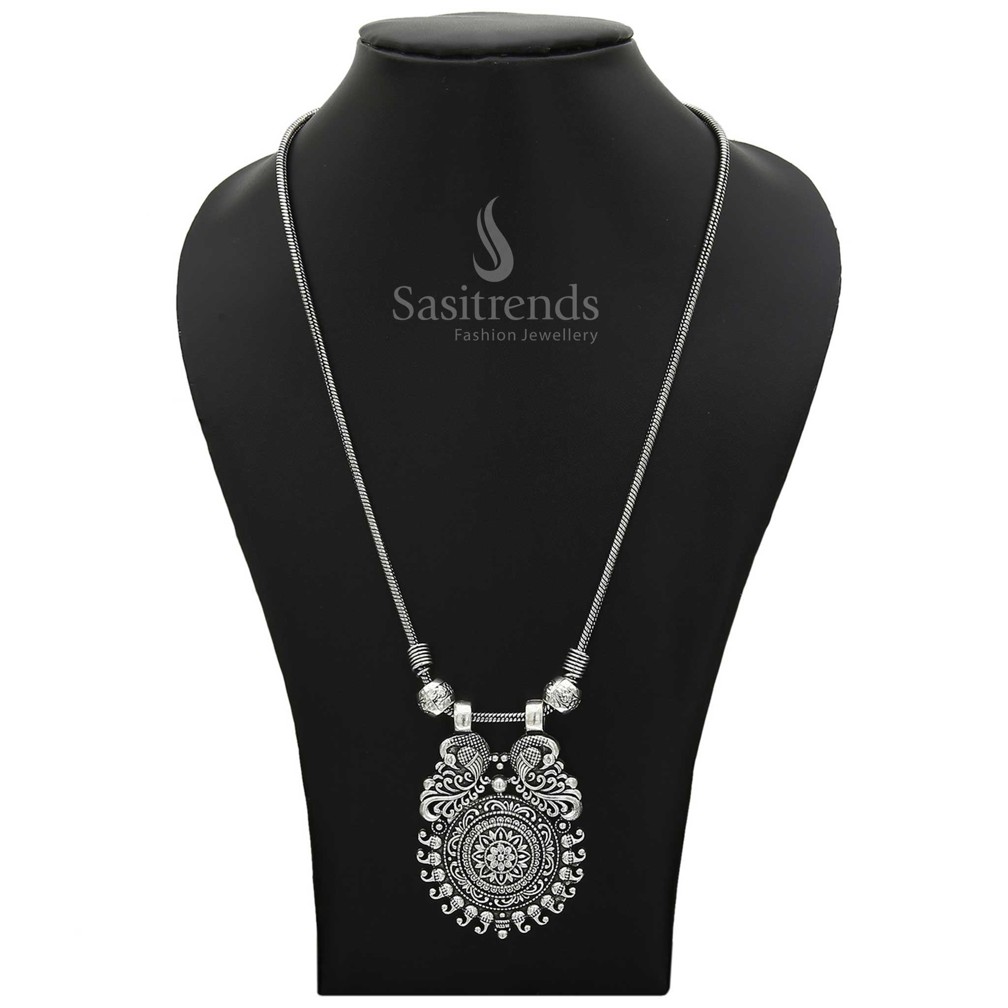 Mayurika Peacock Pendant with Floral Center - Oxidised & Gold – Sasitrends
